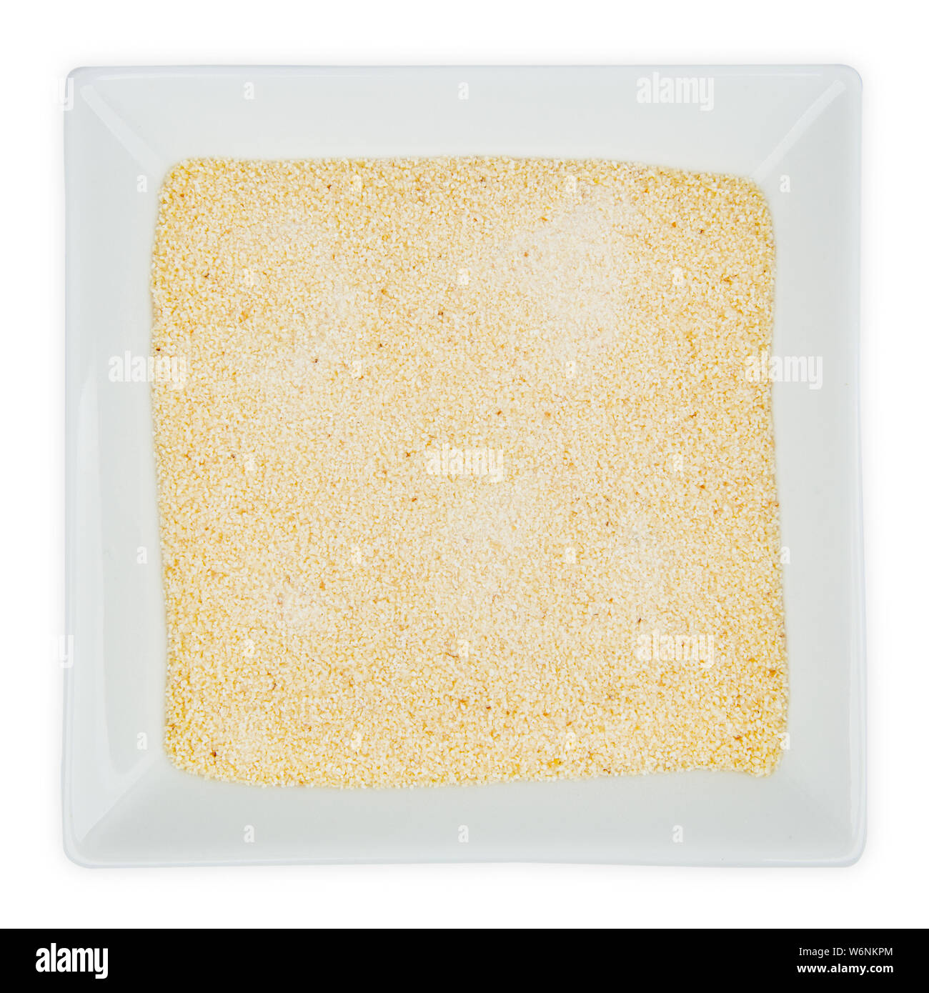 Semolina grain in a bowl isolated on white background Stock Photo - Alamy