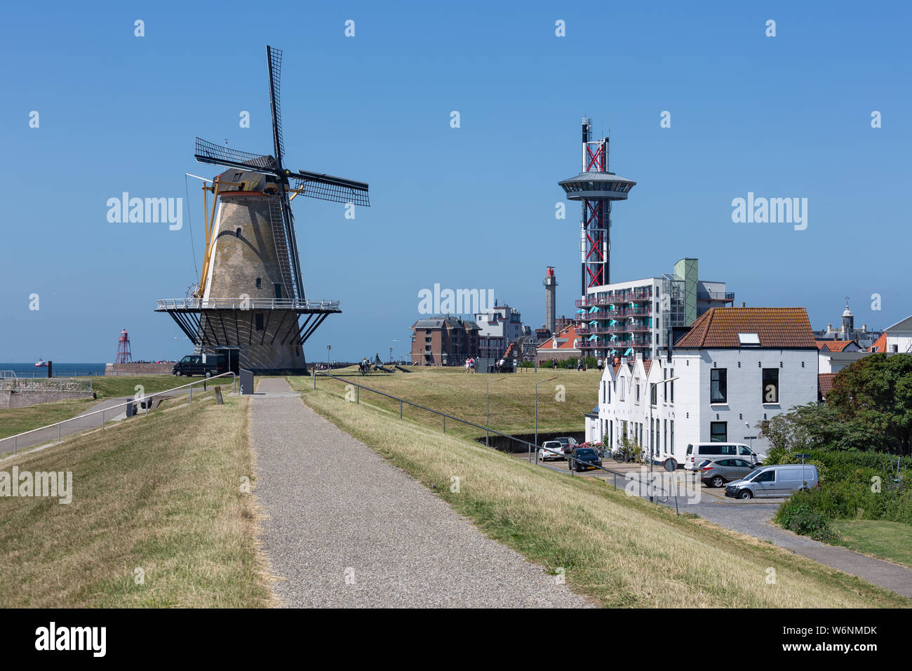 Dutch traditional windmill at dike near city Vlissingen Stock Photo - Alamy