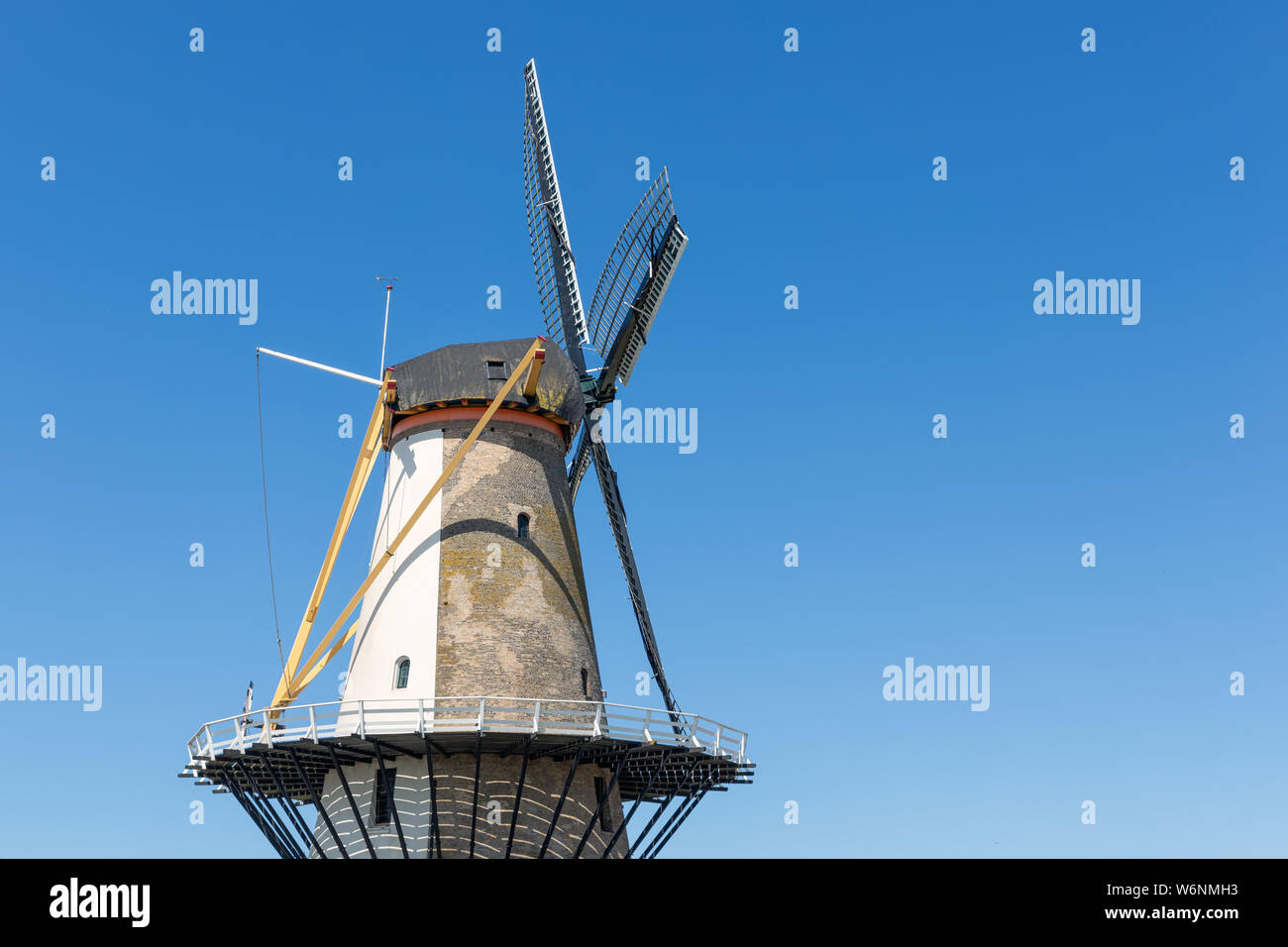 Dutch traditional windmill Oranjemolen at dike near Vlissingen Stock ...