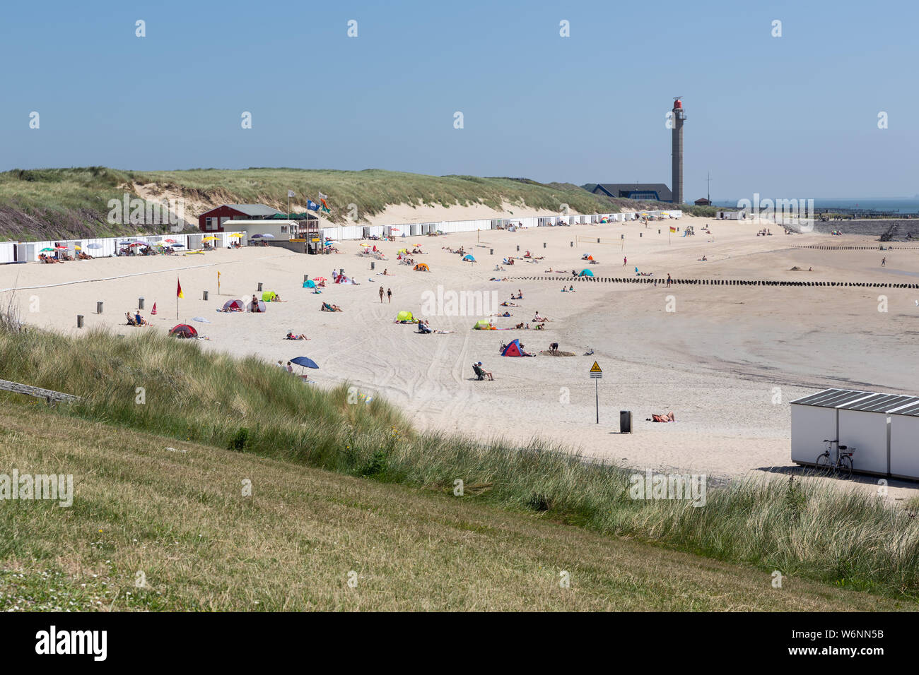 Dutch coast with seaside visitors relaxing at the beach Stock Photo - Alamy