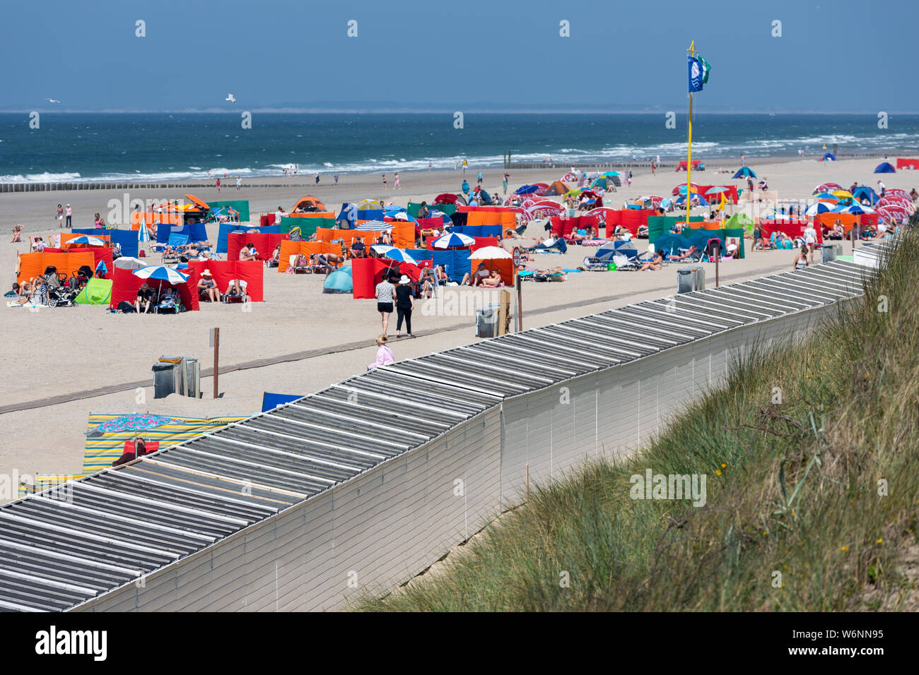 Dutch coast with seaside visitors relaxing at the beach Stock Photo - Alamy