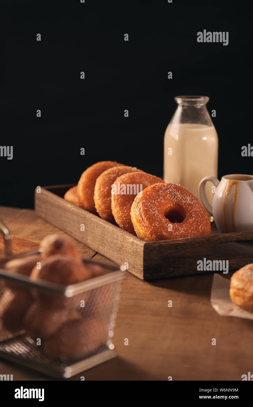 Sugar donuts with a glass of milk Stock Photo - Alamy