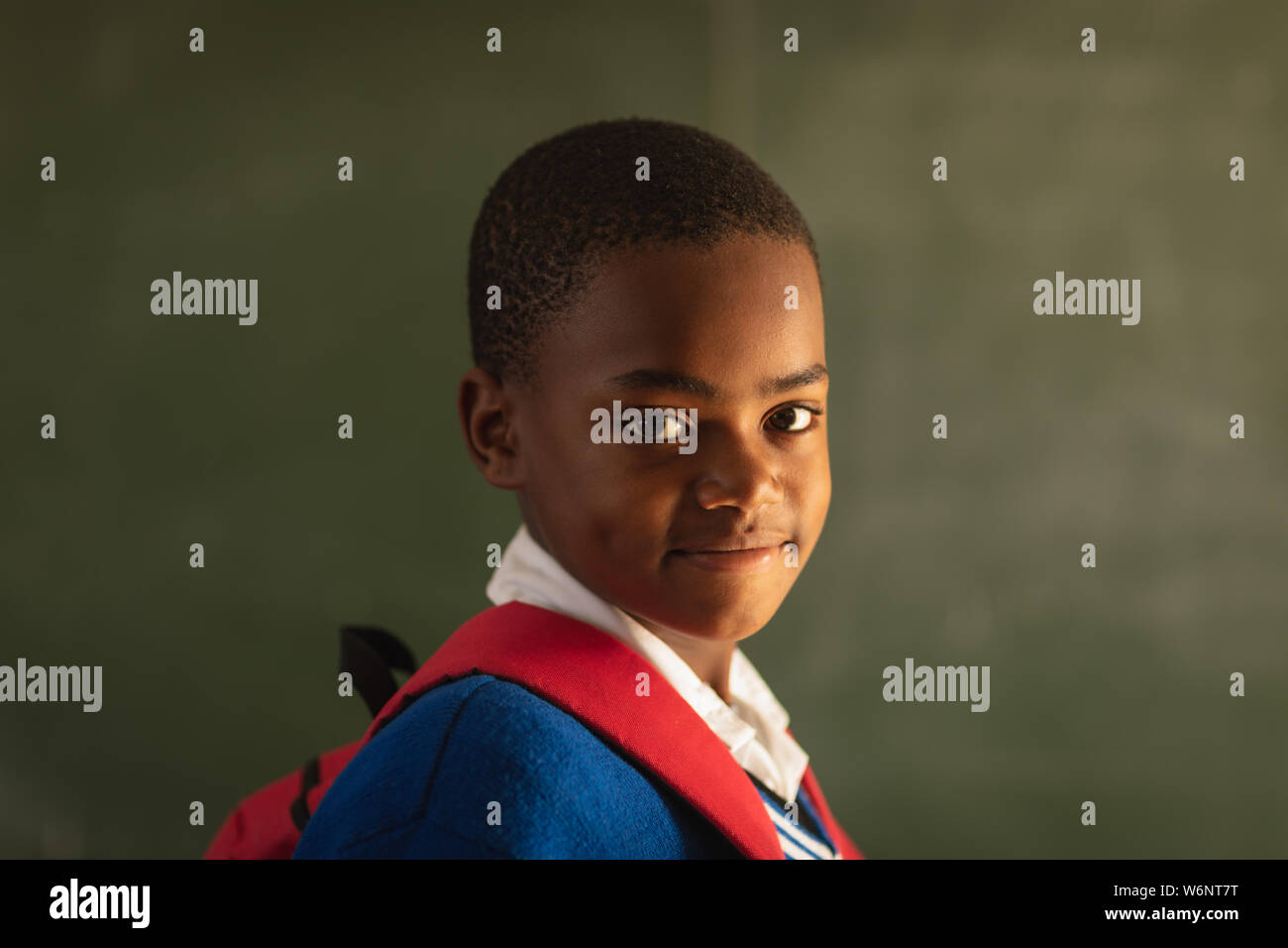 Portrait of a smiling elementary school boy Stock Photo - Alamy