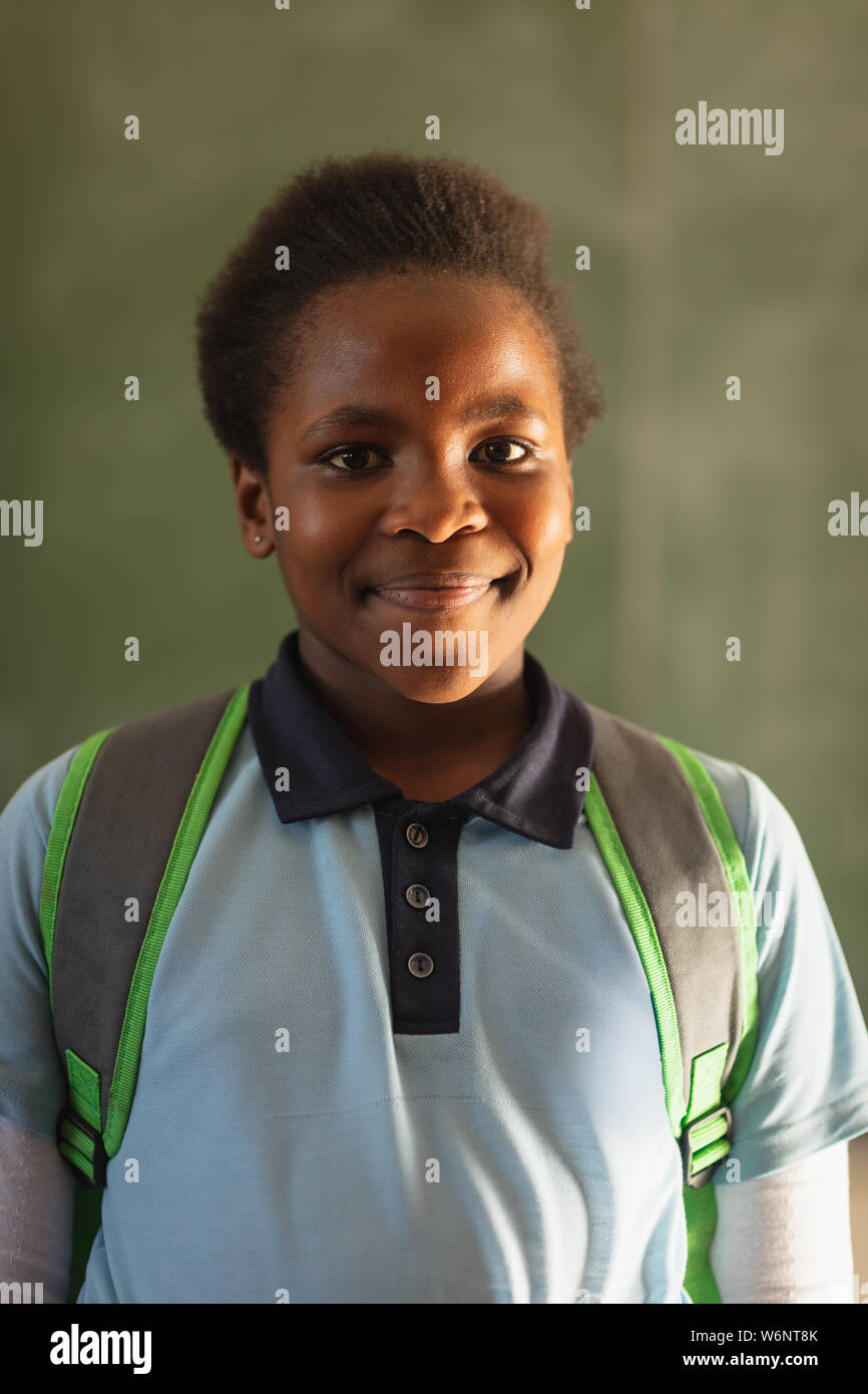 Portrait of a smiling elementary school girl Stock Photo - Alamy