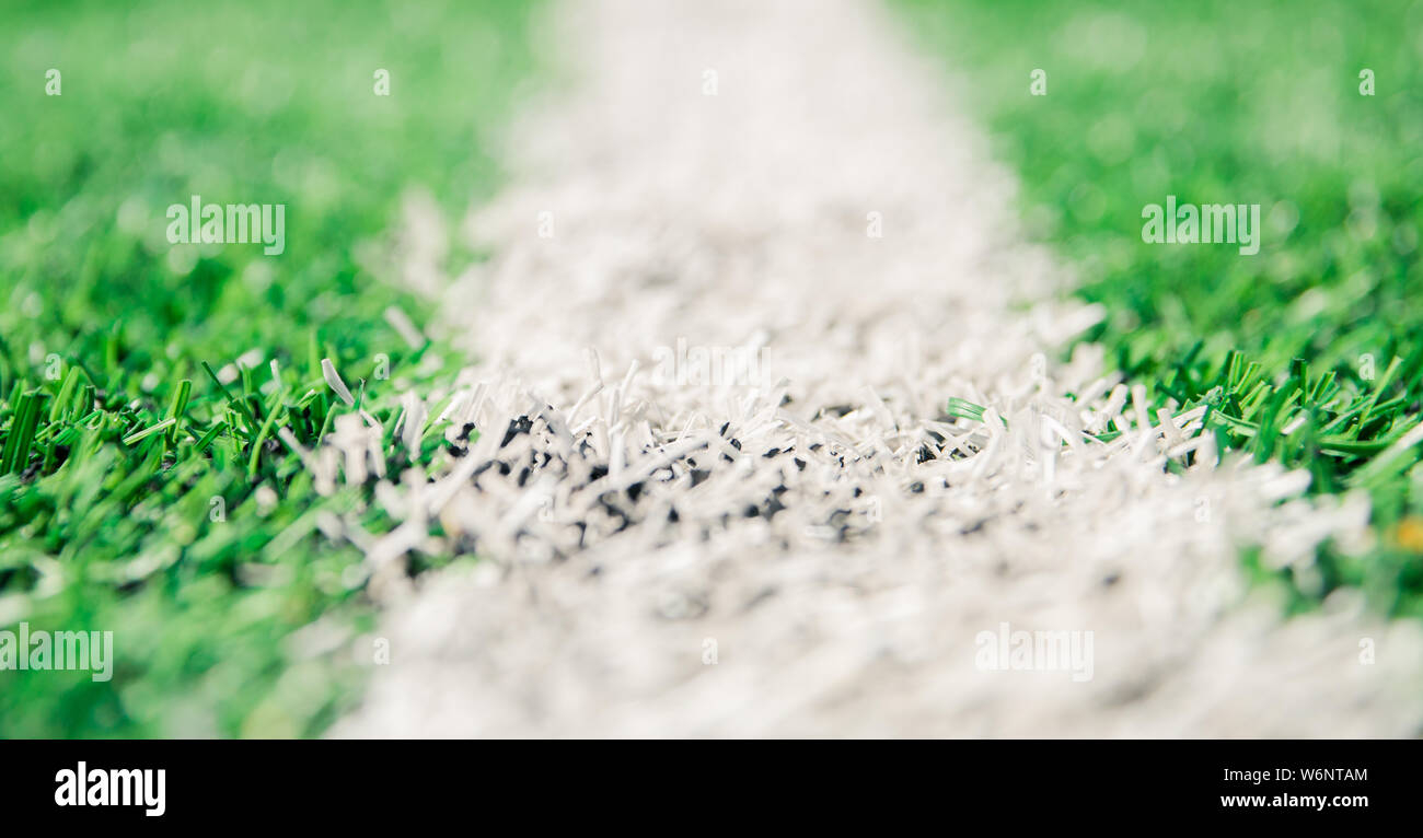 Green Football background with a vertical line Stock Photo - Alamy
