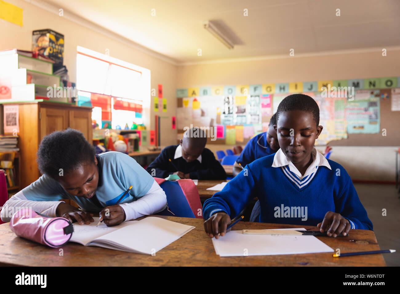 Schoolchildren in a lesson at a township school Stock Photo - Alamy