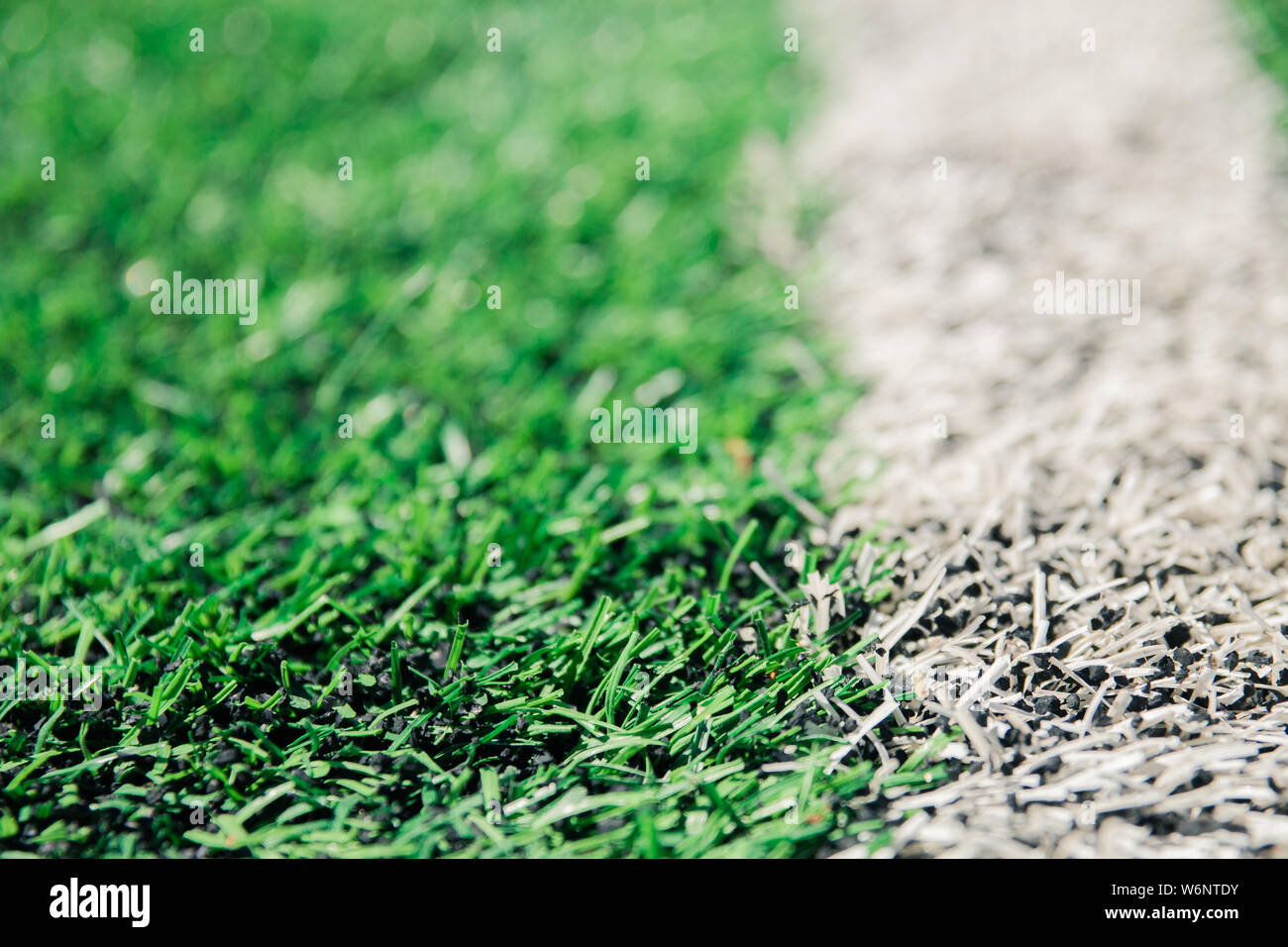 Green Football background with a vertical line Stock Photo - Alamy