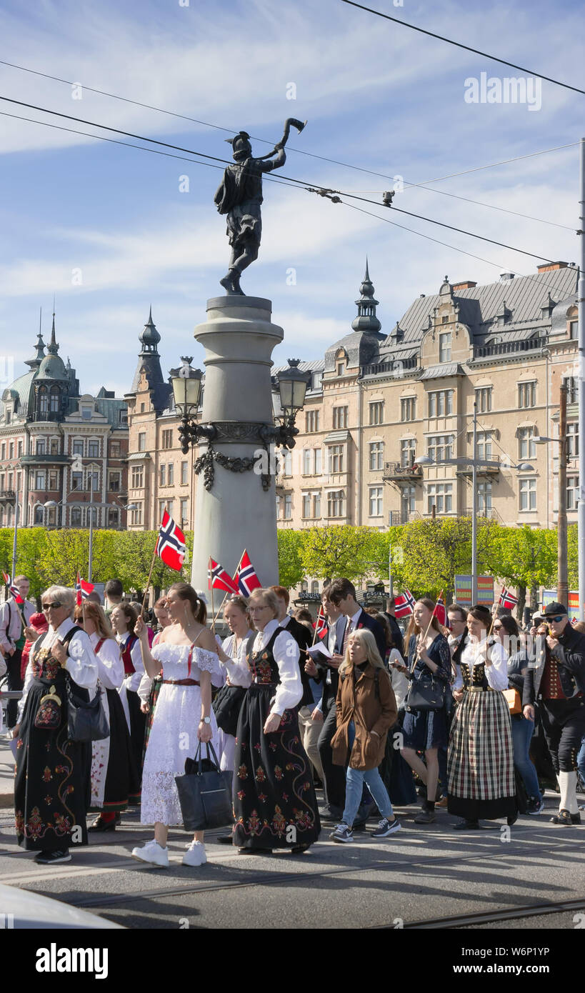 Norwegian and Scandinavian patriotic crowds passing by Djurgardsbron ...