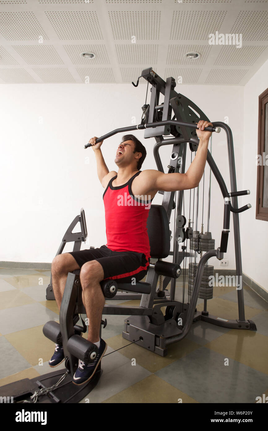 Weightlifting physical exercise bodybuilding machine hi-res stock ...