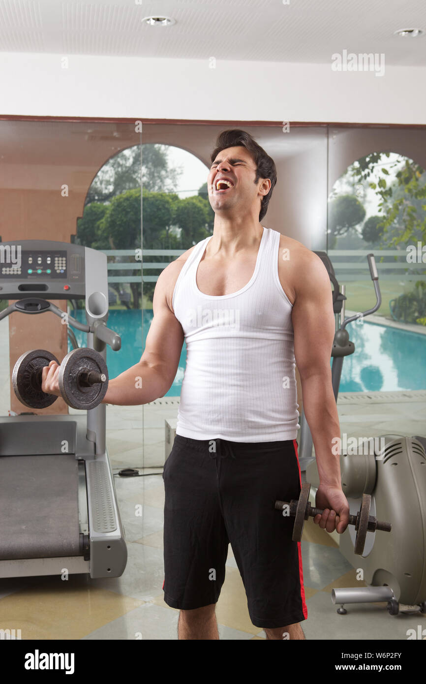 Indian sports man gym exercising hi-res stock photography and images ...