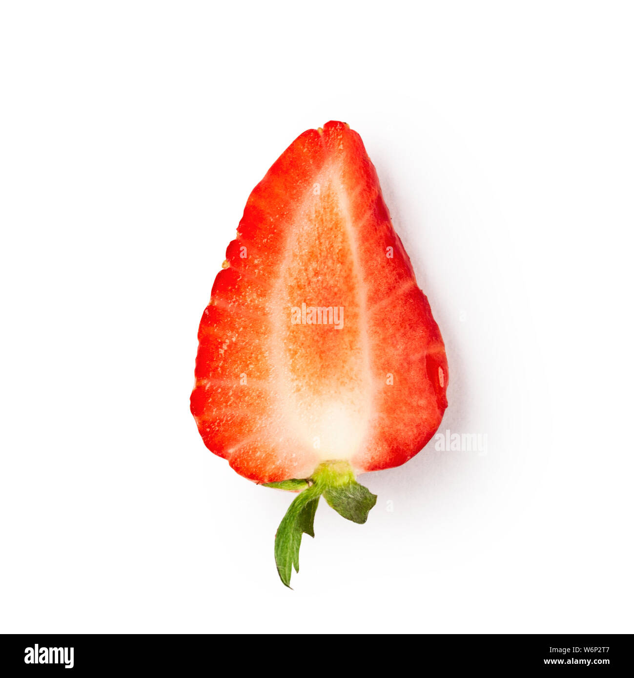 Fresh strawberry slice with leaves isolated on white background with ...