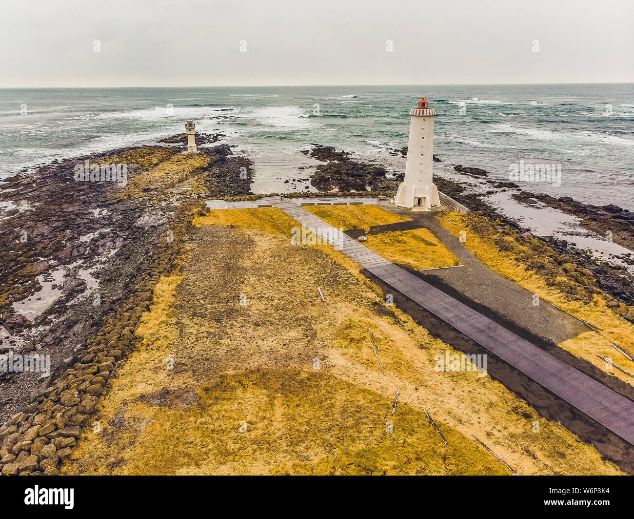 Old lighthouse White on the hill There are stone stairs around the area ...