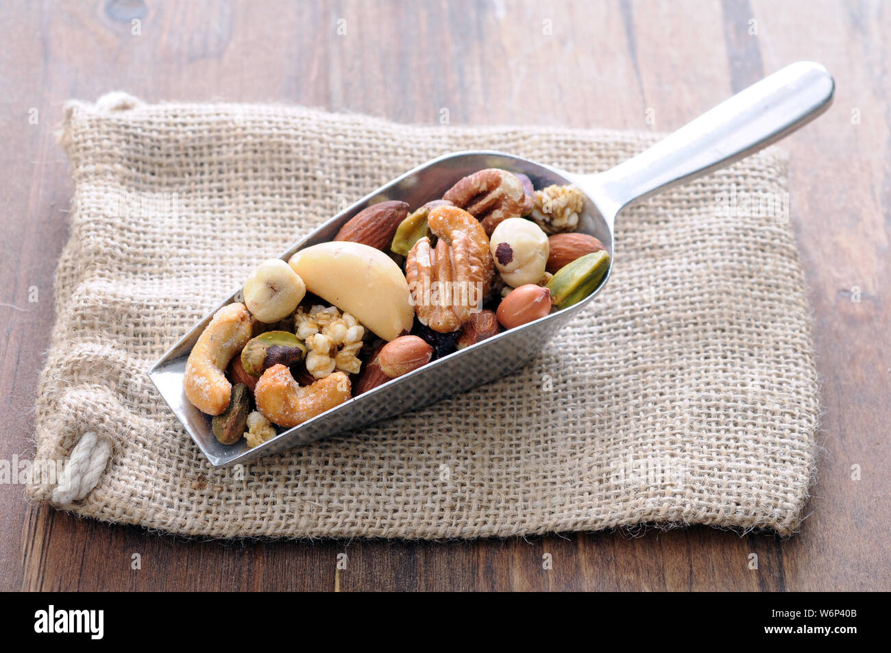 healthy roasted nuts in spoon display at market place Stock Photo - Alamy