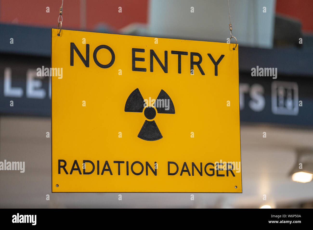 Yellow radiation warning and hazard sign forbidding entry to a ...