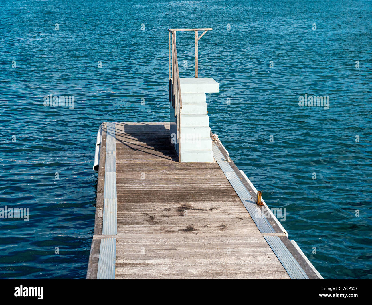 Beach pier with elevated platform for water jumping, sightseeing ...