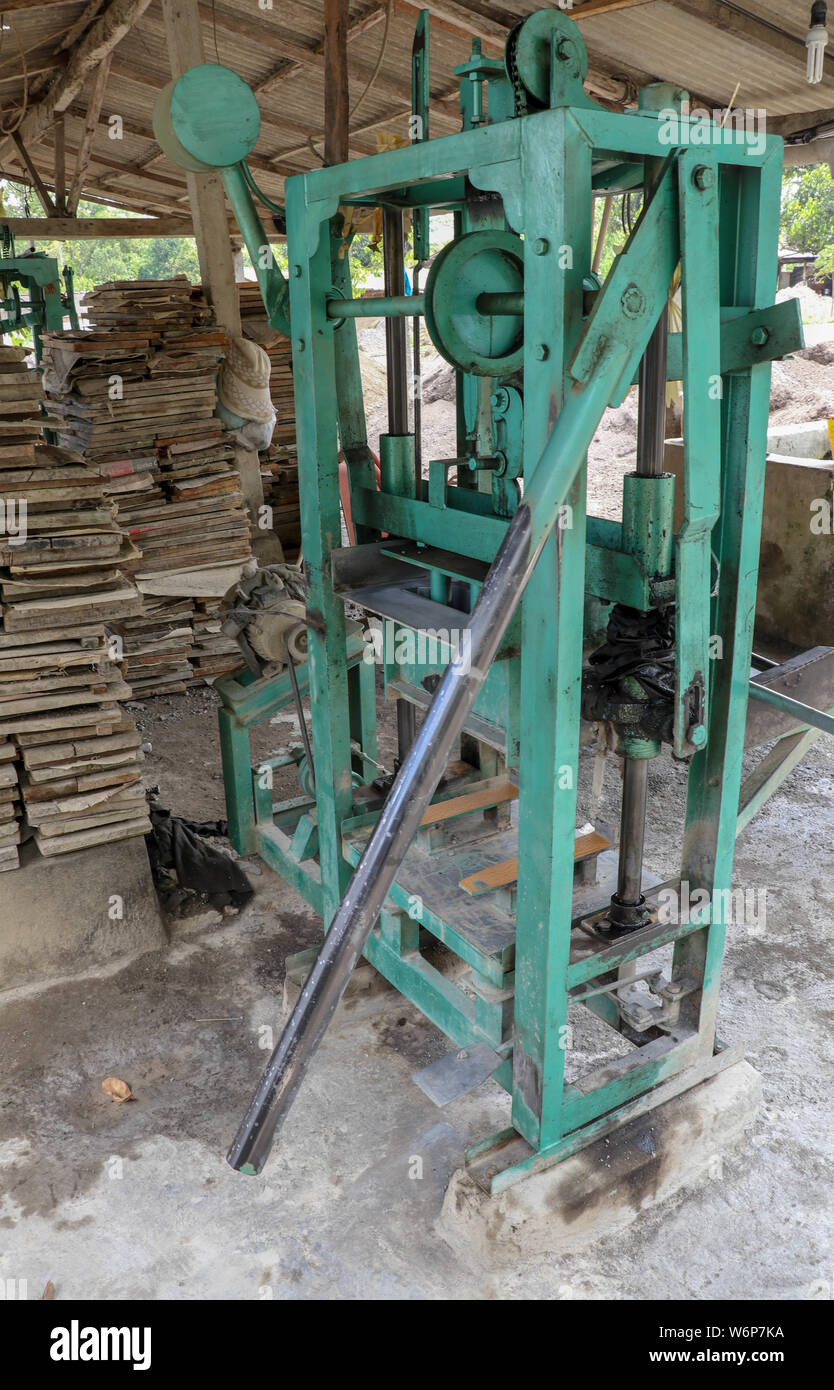 Hand press for brick production. Handmade bricks in Bali, Indonesia ...