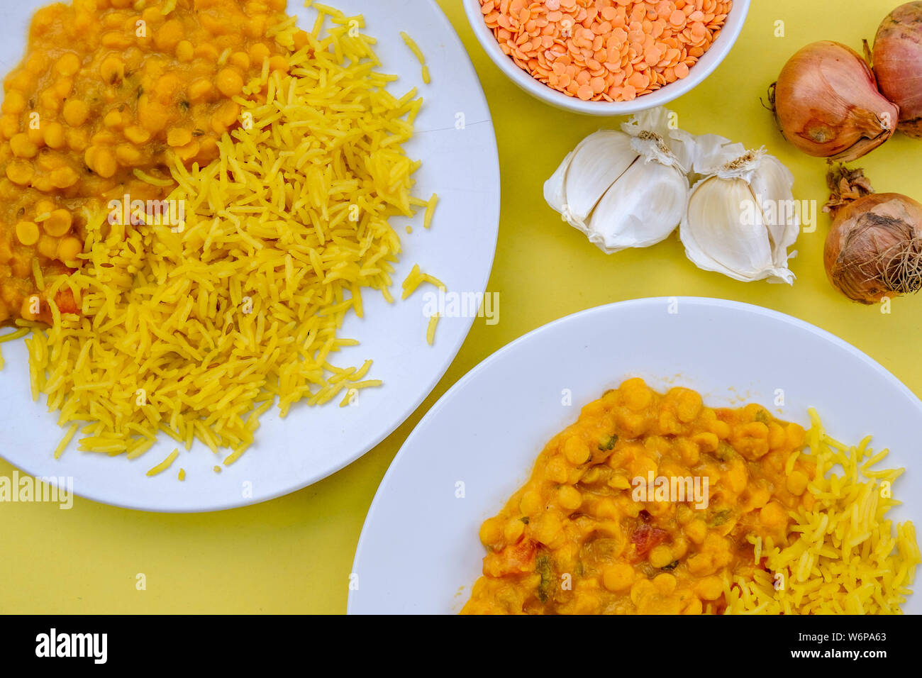 Indian Style Vegetarian Tarka Dal With Pillau Rice Onions and Turmeric ...