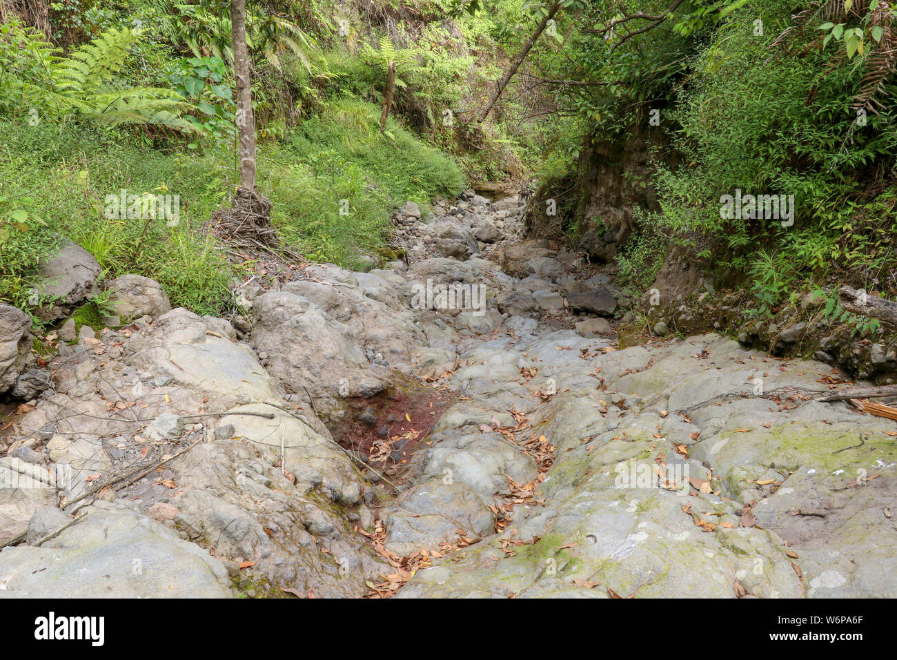A hardened lava flow on the slope of the Agung volcano in Bali. Dry bed ...