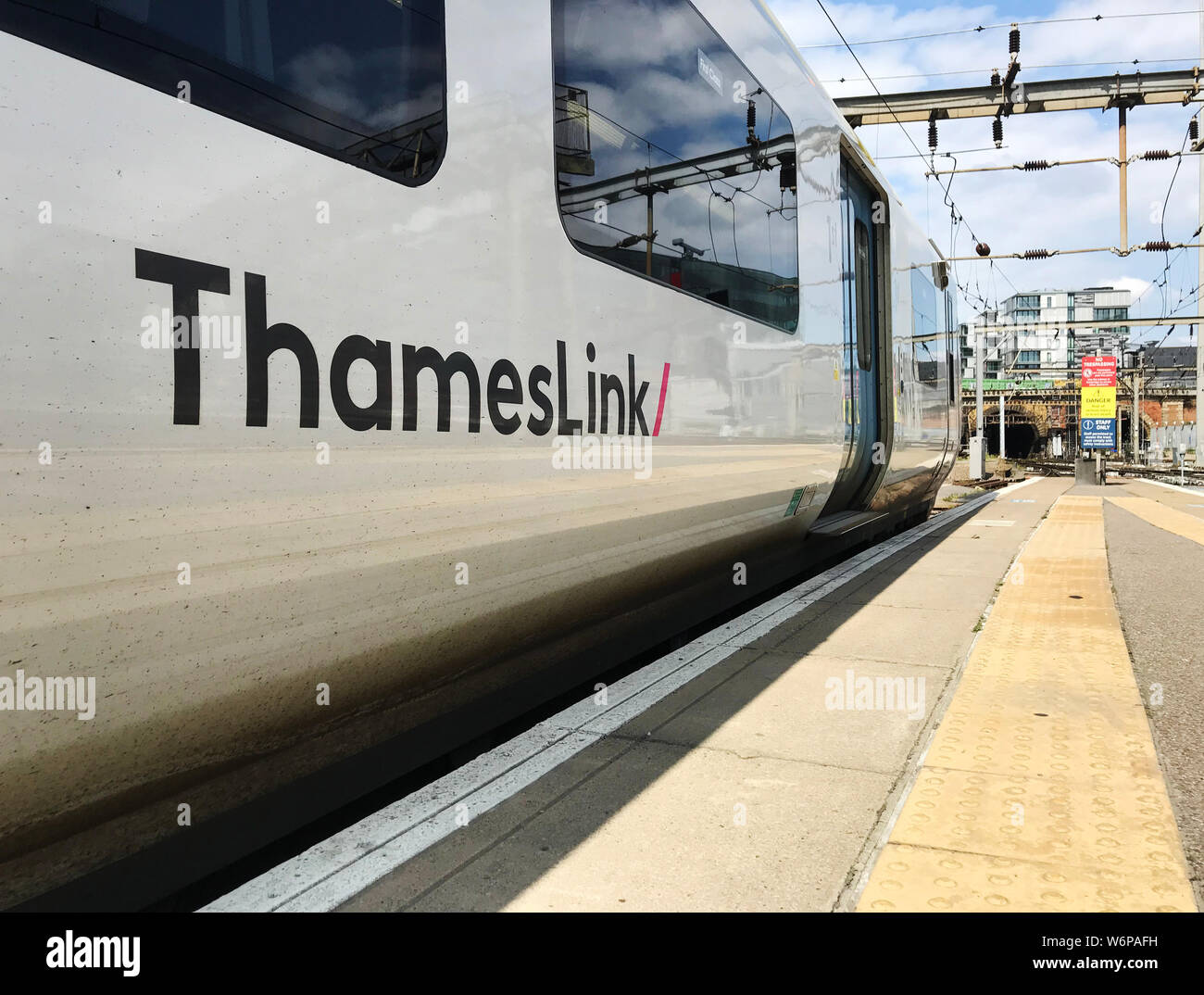General view of a ThamesLink train at Kings Cross station in London ...