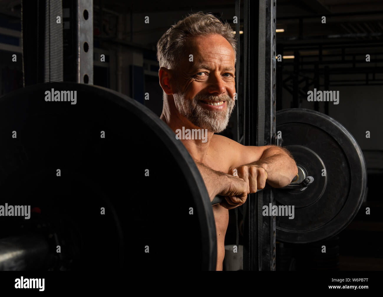 Attractive man muscles looking hi-res stock photography and images - Alamy