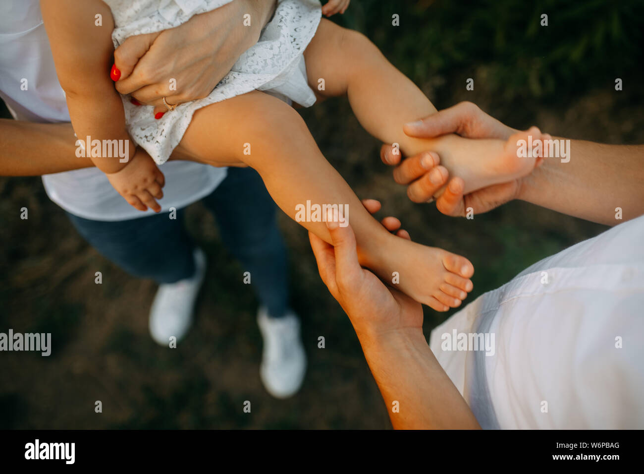 Hold hands and legs hi-res stock photography and images - Alamy