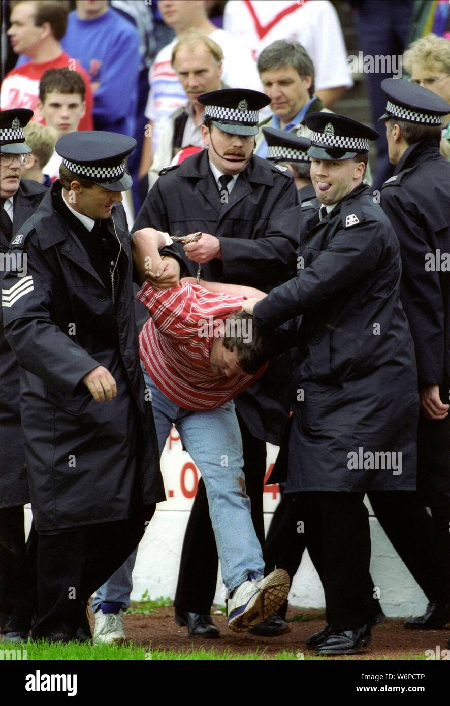 ARRESTED, POLICE RESTRAIN FOOTBALL FAN, 1991 Stock Photo - Alamy