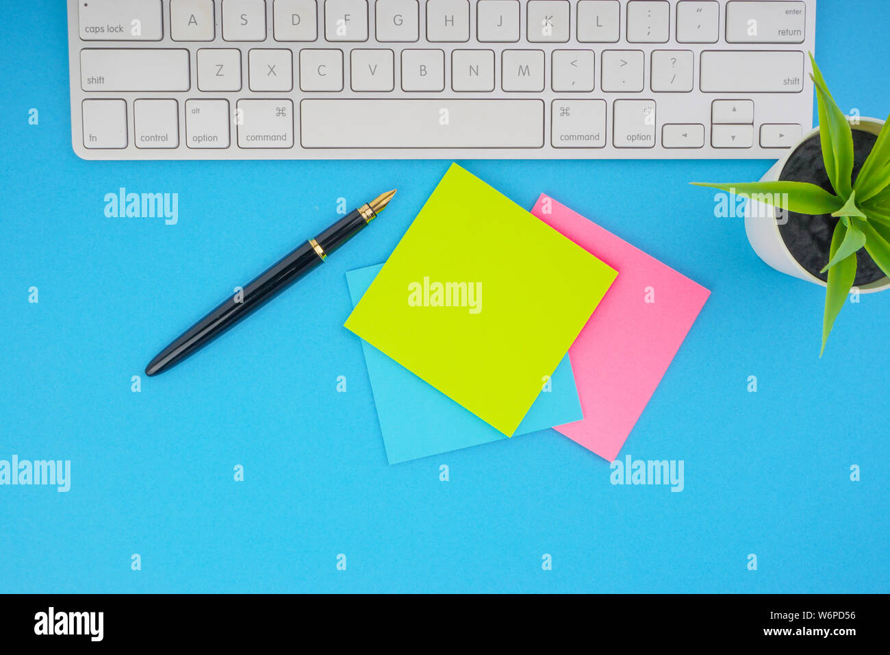 Flat lay, top view office table desk. Workspace with pen, sticky notes ...