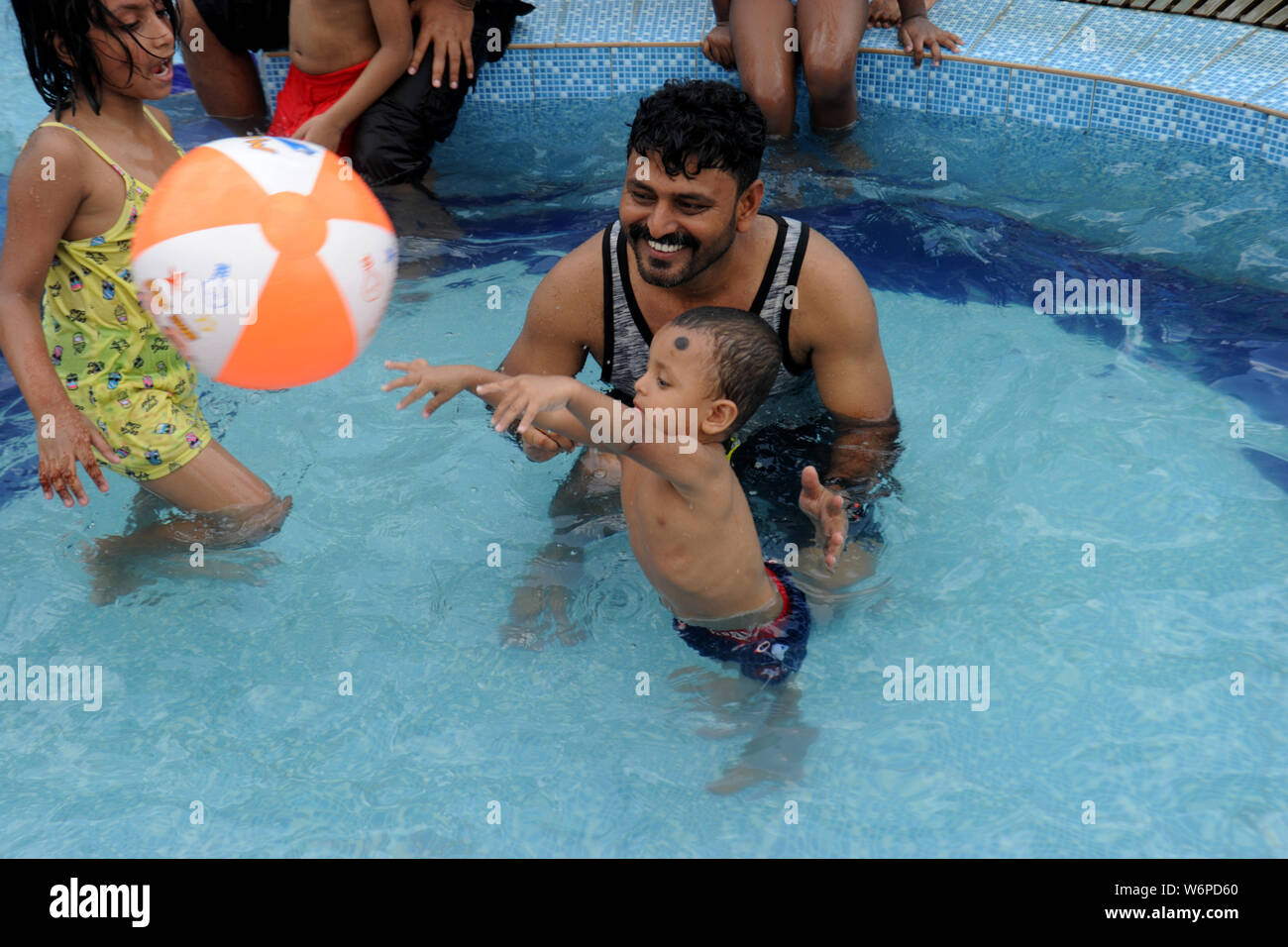 Indian man outdoor swimming pool hi-res stock photography and images ...