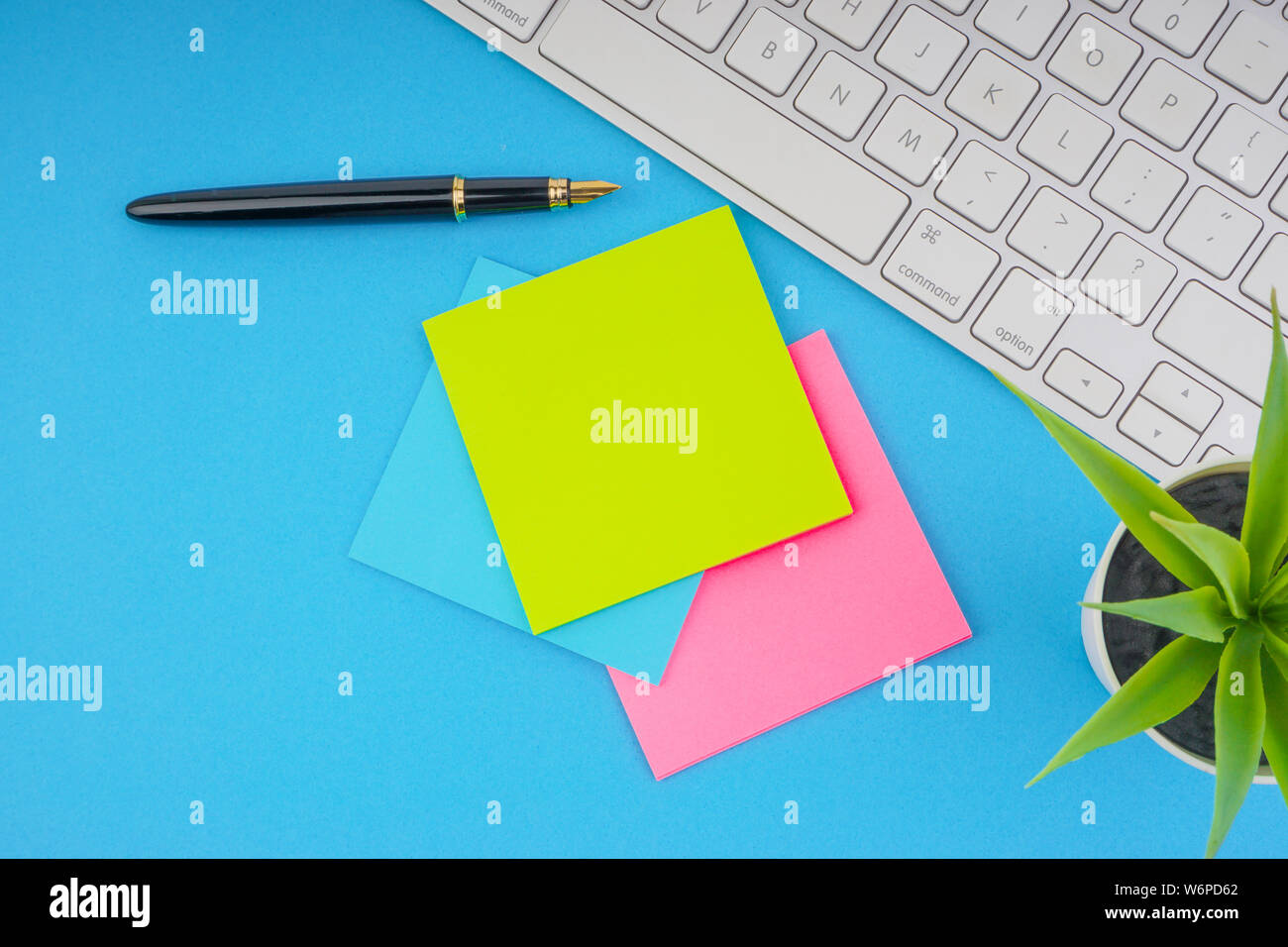 Flat lay, top view office table desk. Workspace with pen, sticky notes ...