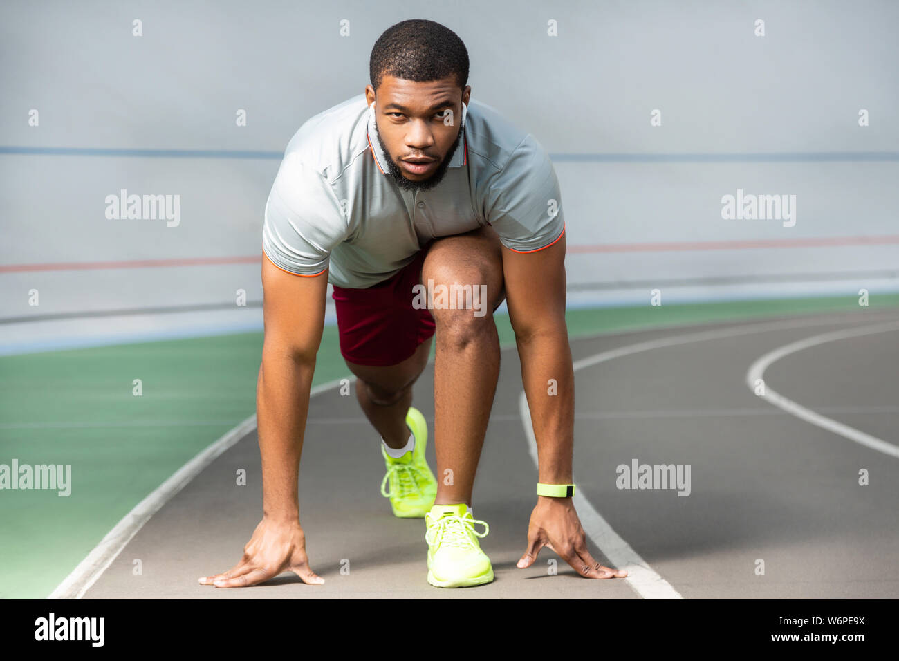 Focused african american athlete preparing hi-res stock photography and ...