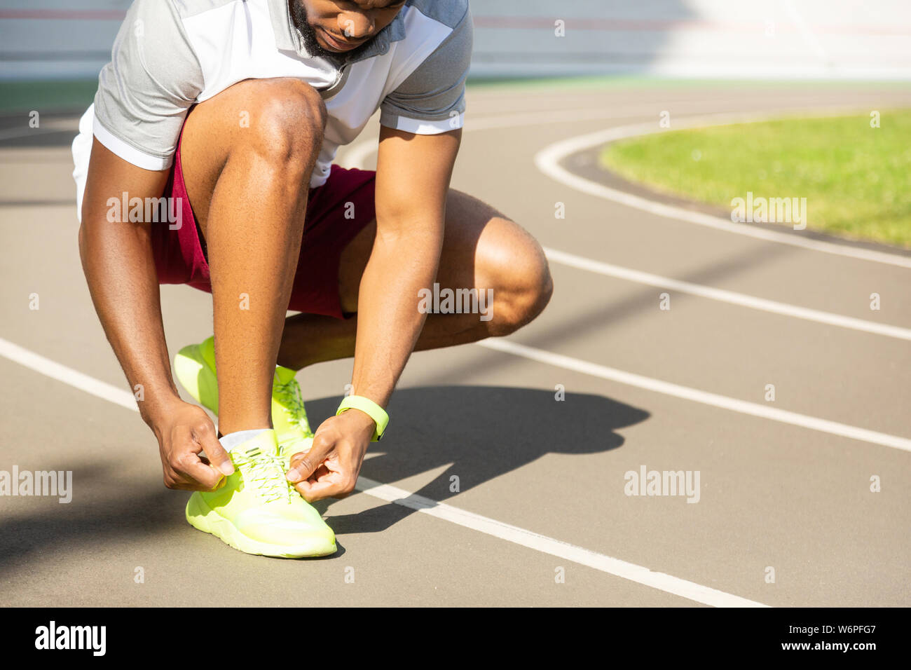 African man tying shoes hi-res stock photography and images - Alamy