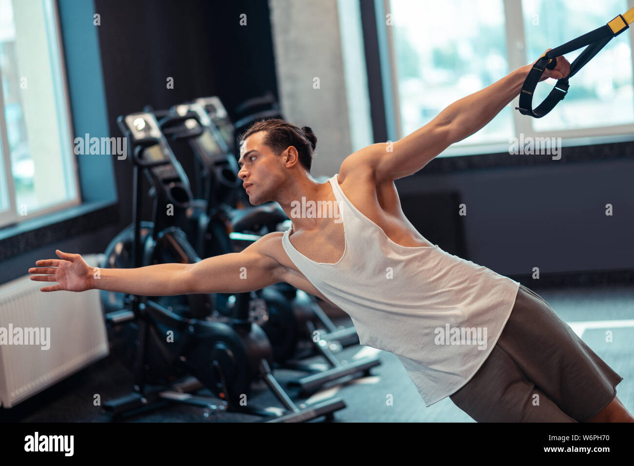 Handsome good looking man doing a sports exercise Stock Photo - Alamy