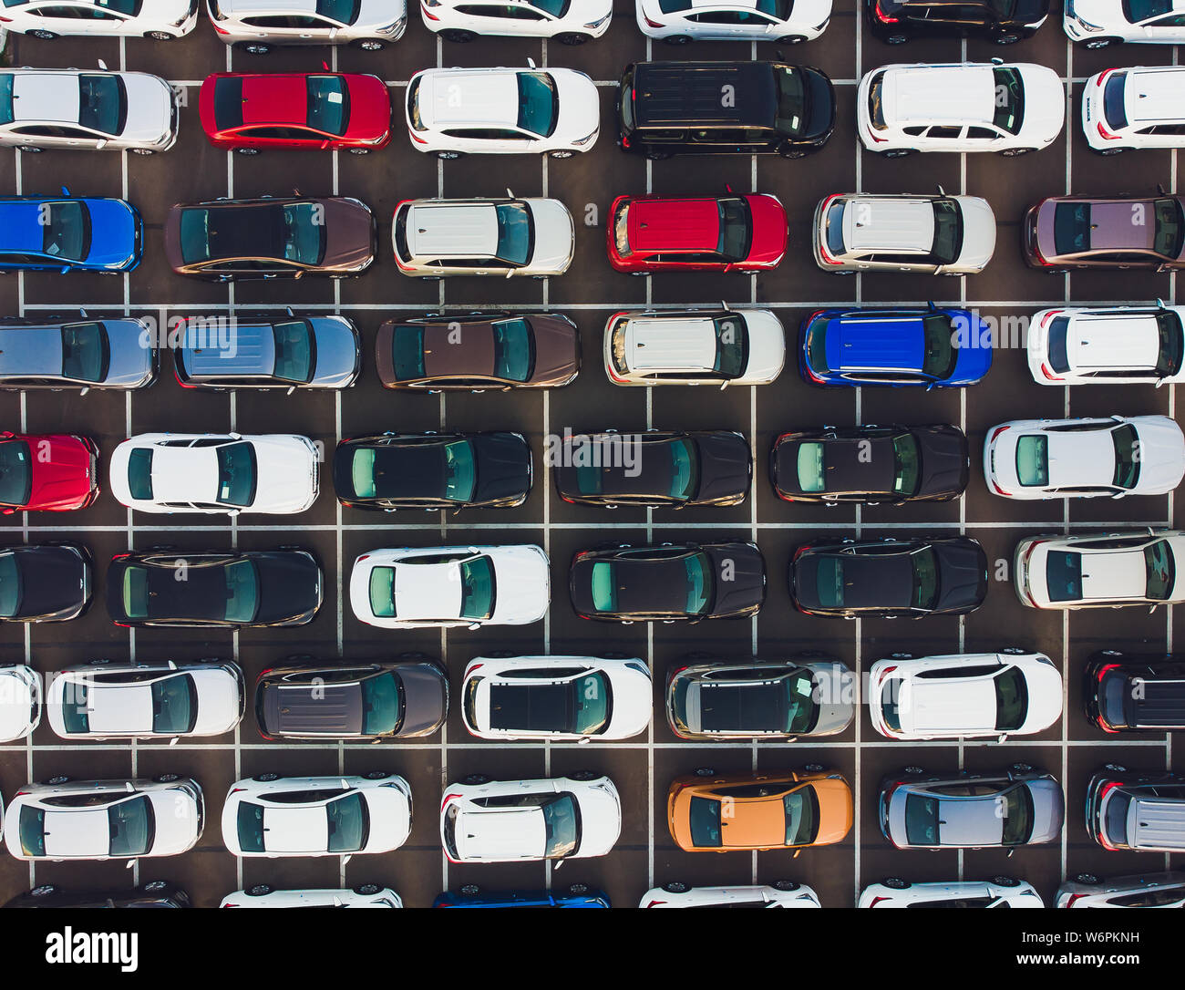 Top view of new cars lined up outside an automobile factory for import ...