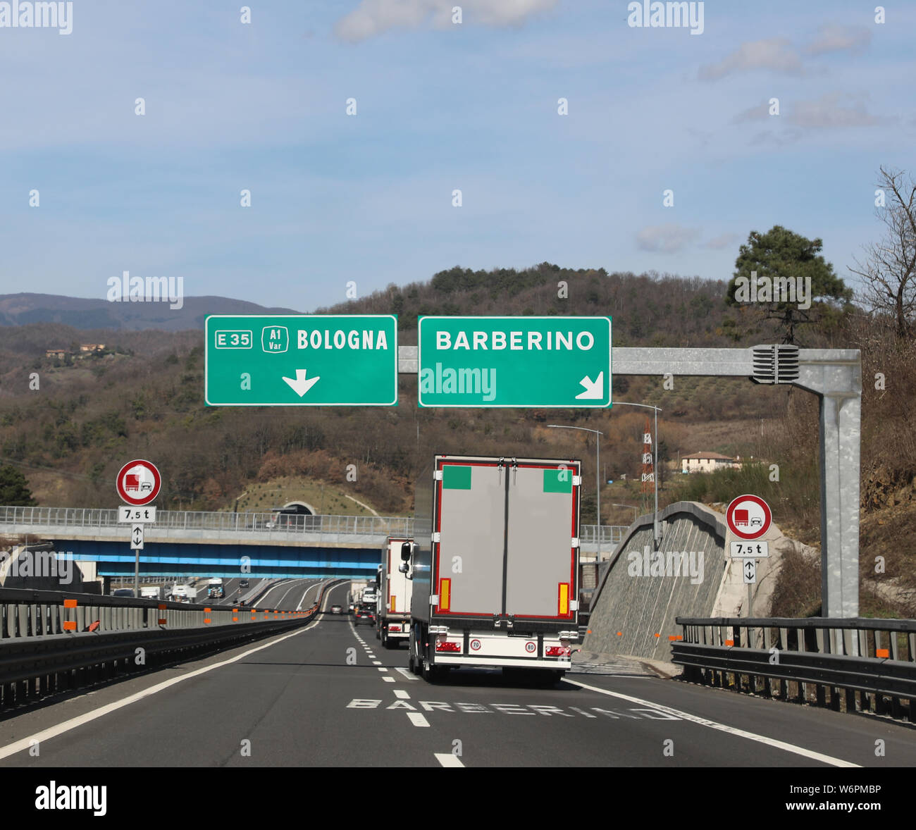 big highway sign in Central Italy with name of two city: Bologna and ...
