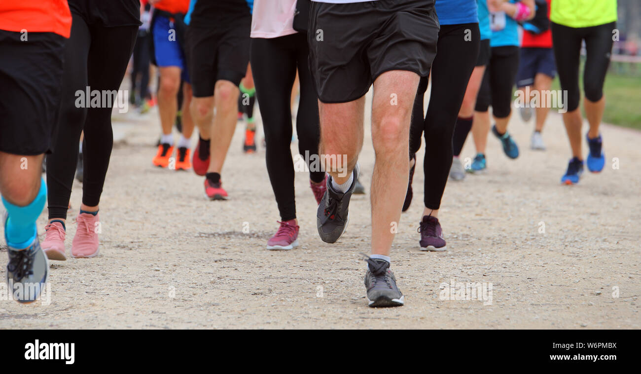 running athletes during a cross-country race on gravelly ground Stock ...