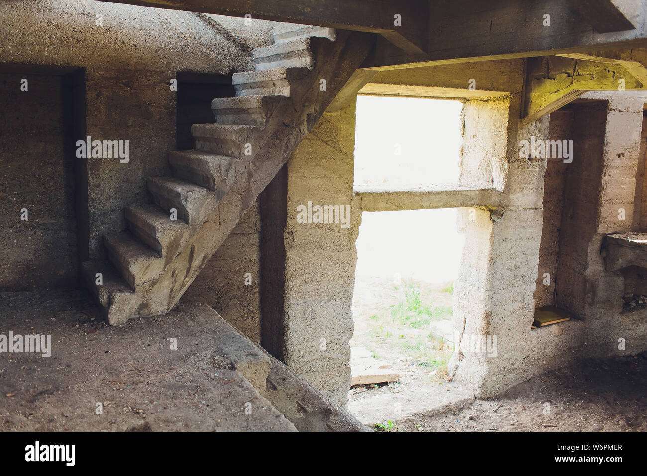 The destroyed big concrete building in a foggy haze. The remains of the ...