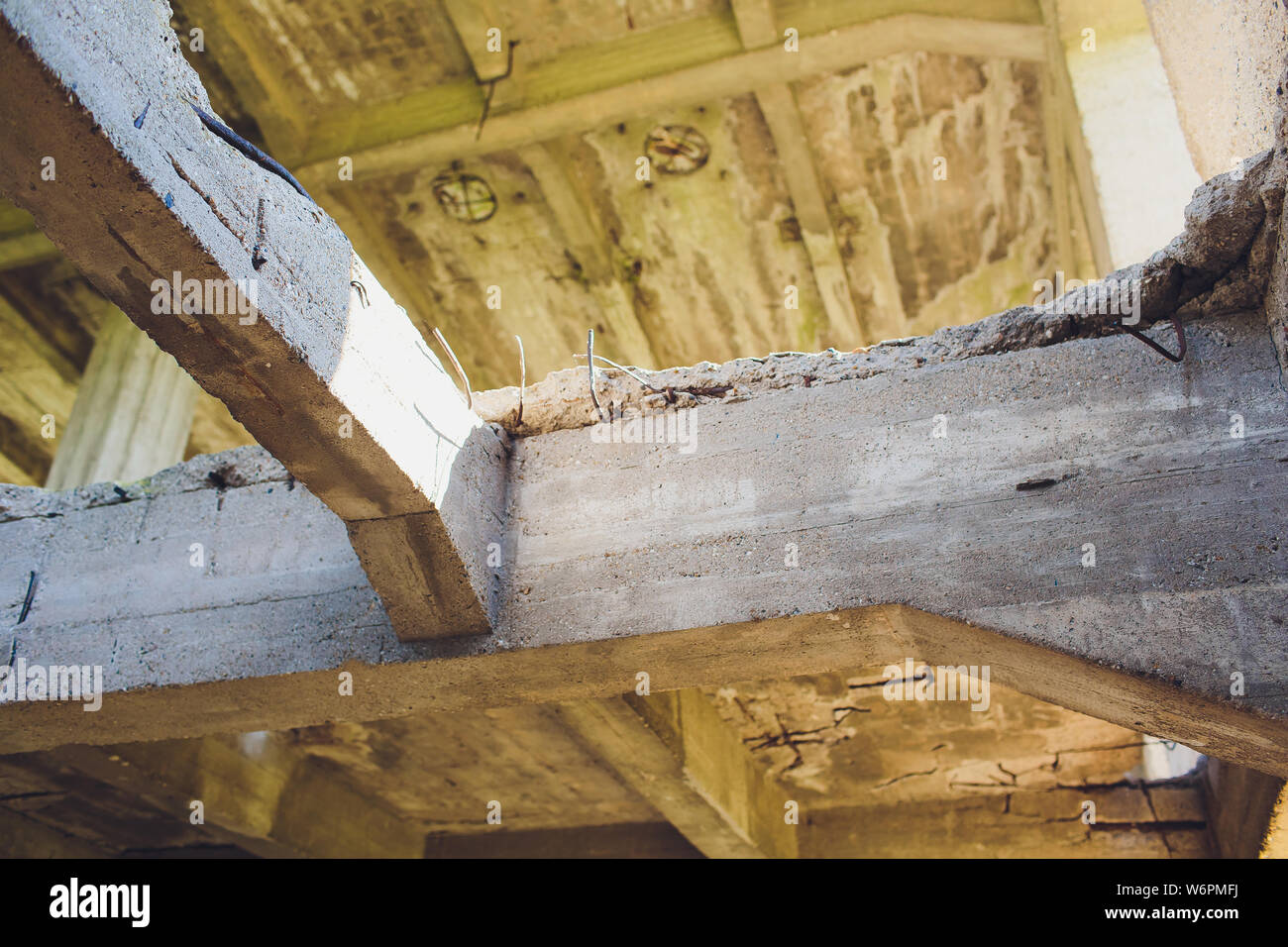 The destroyed big concrete building in a foggy haze. The remains of the ...