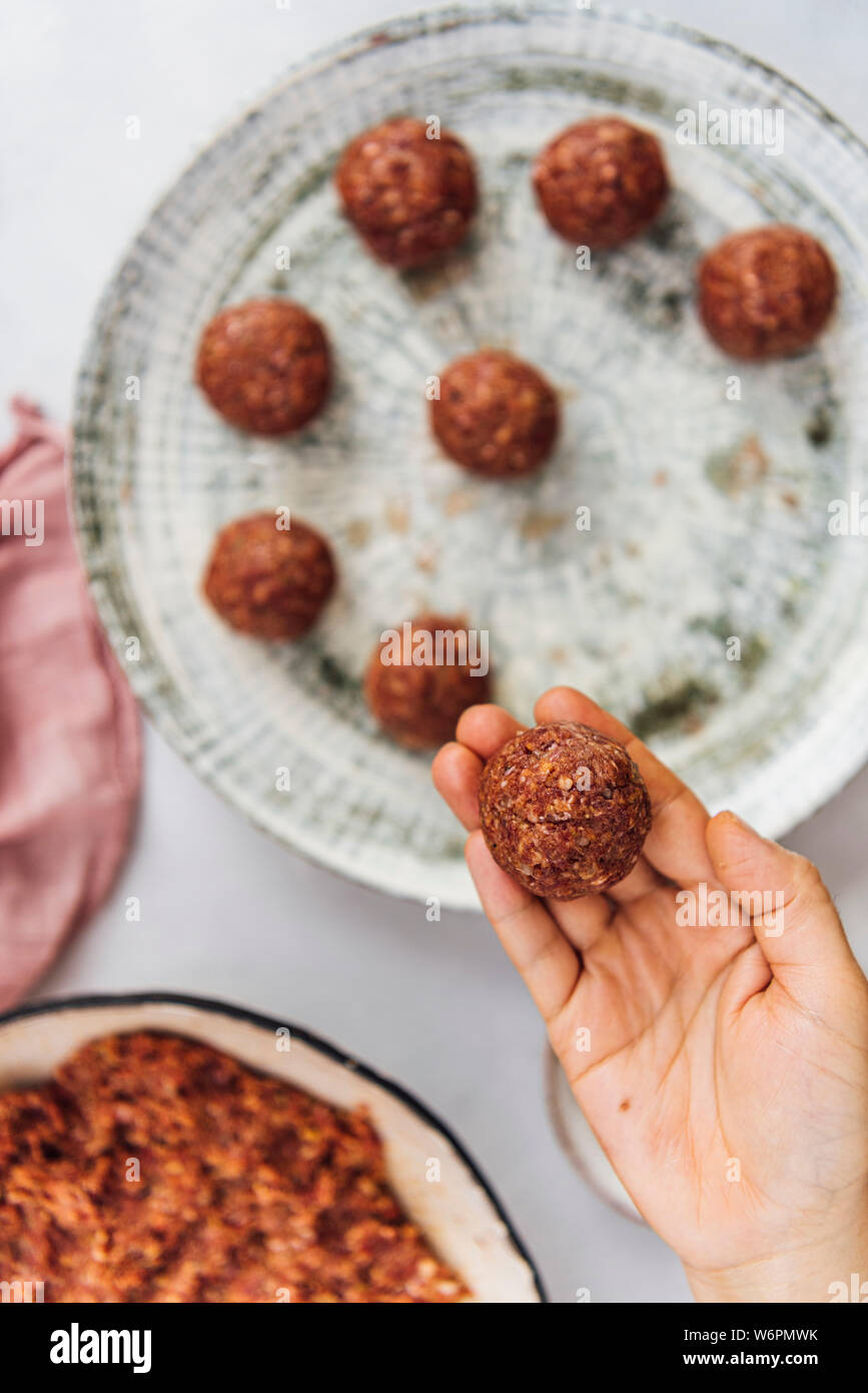 Hand with beef meatball hi-res stock photography and images - Alamy