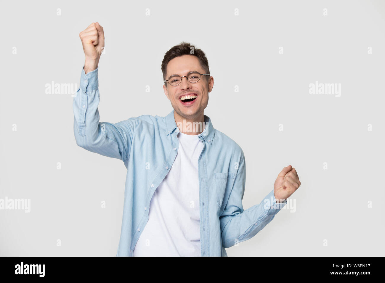 Businessman victory pose hi-res stock photography and images - Alamy
