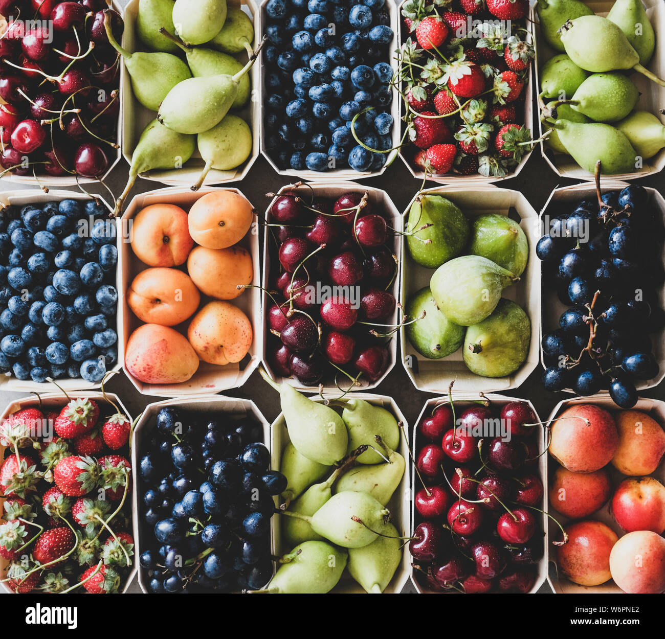 Summer fruit and berry assortment. Flat-lay of strawberries, cherries ...