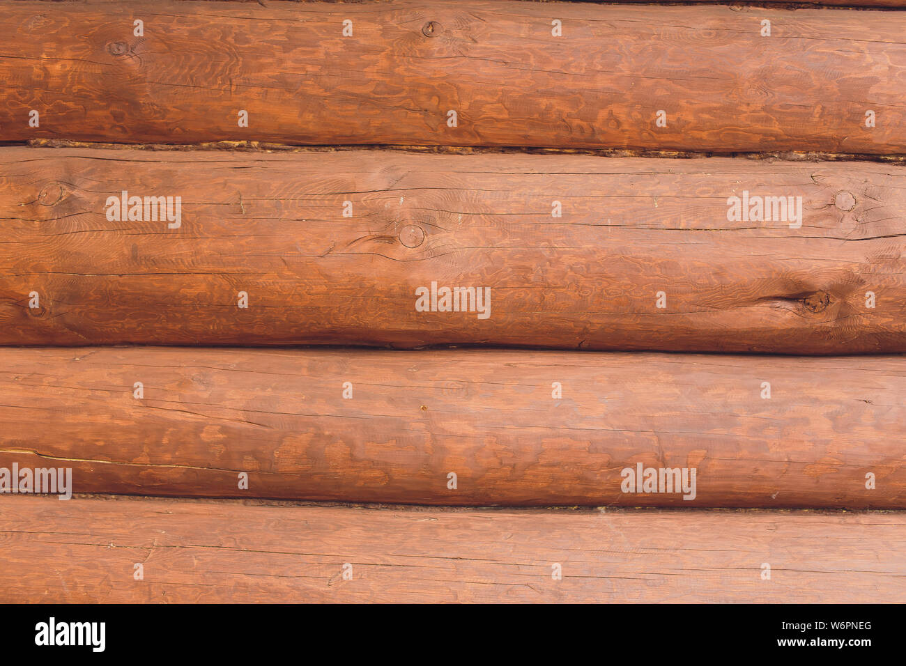 wooden wall from round logs close-up brown Stock Photo - Alamy