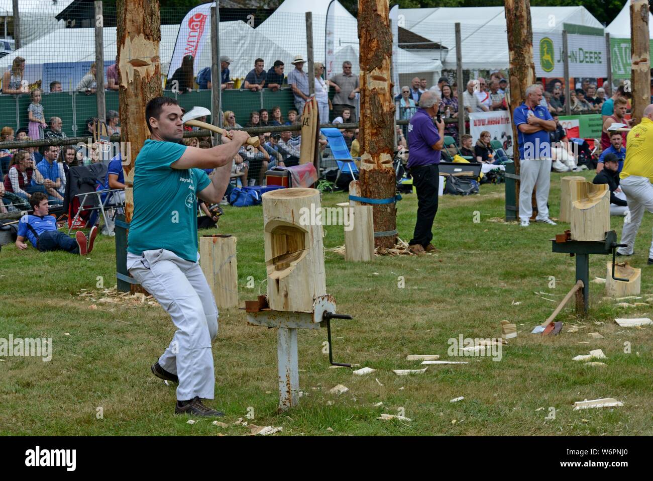 Axemen from several countries competing at the standing block ...