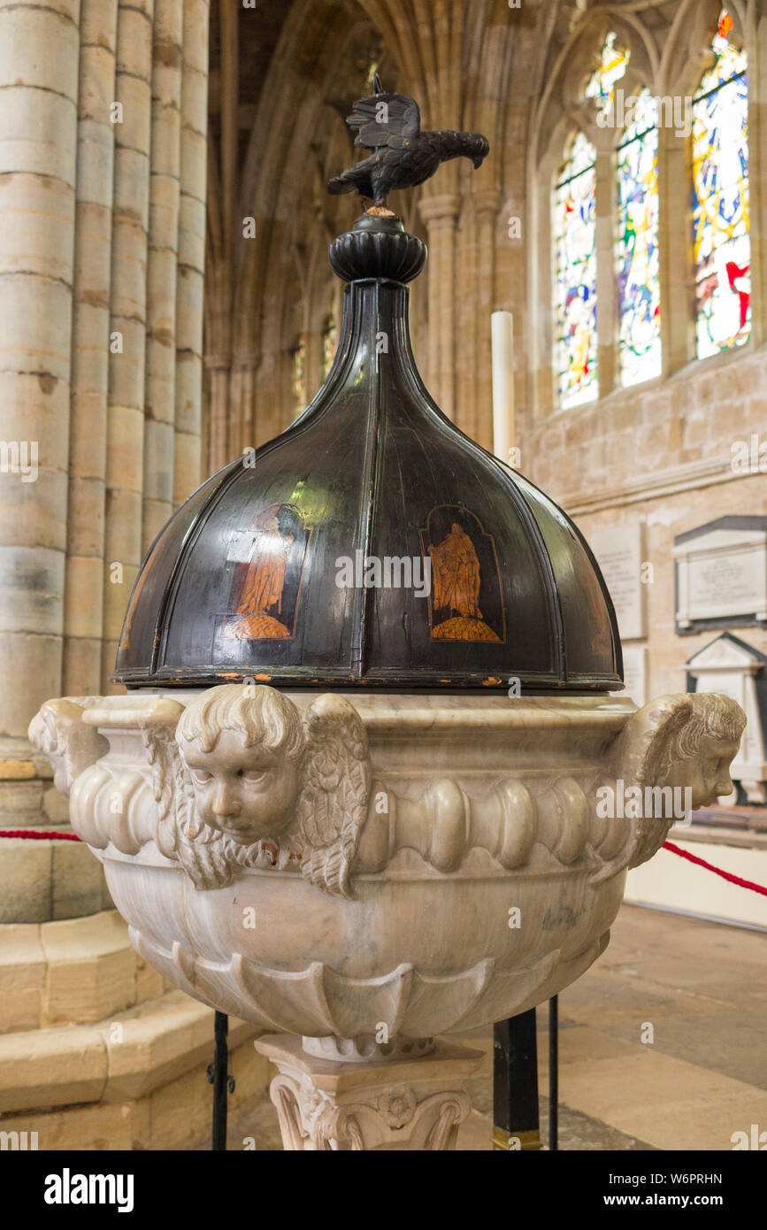 Baptismal font in the nave of Exeter Cathedral; in the Southwest corner ...