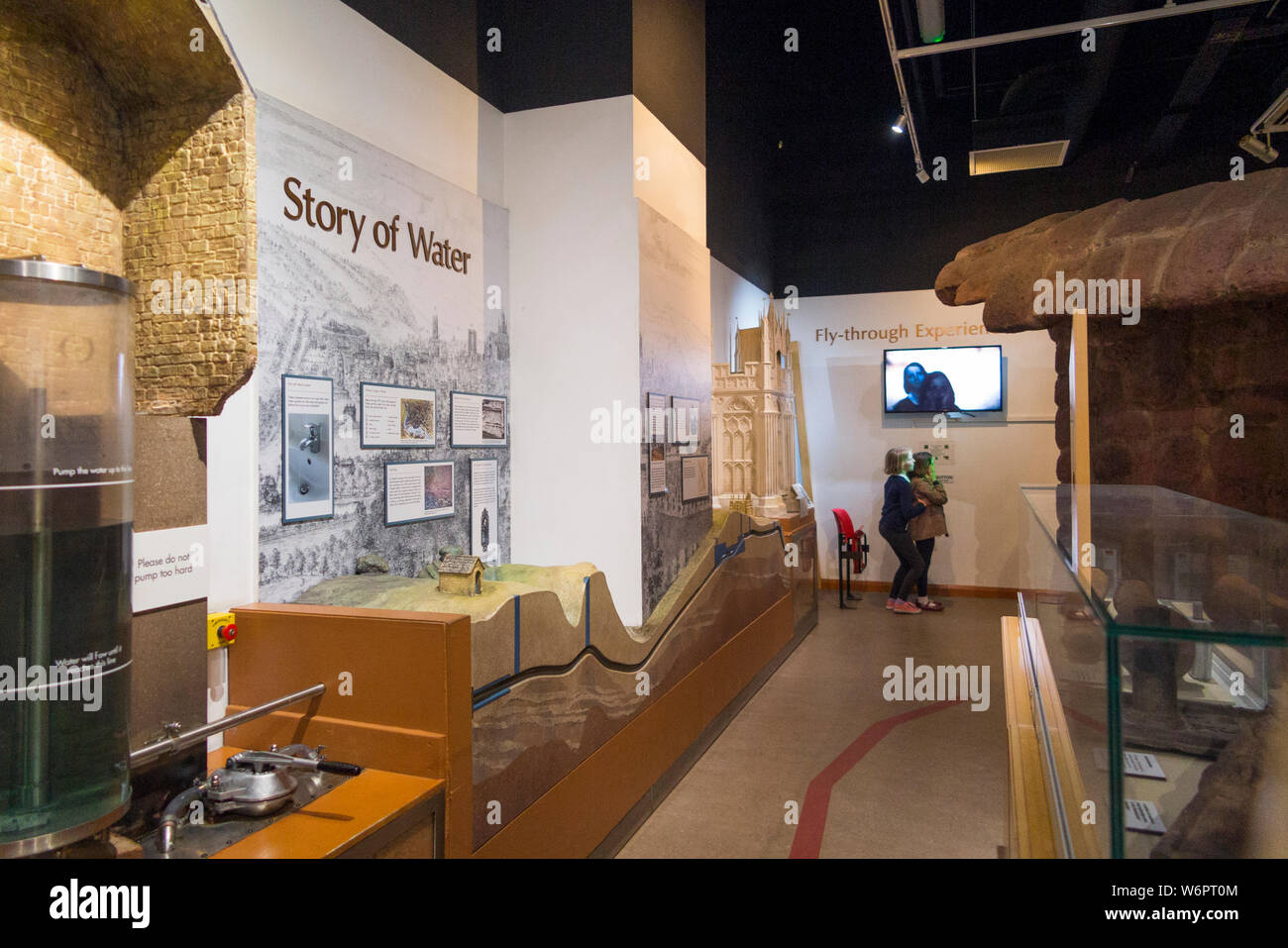 Tourists and visitors inside the Heritage Centre at the start of Exeter ...