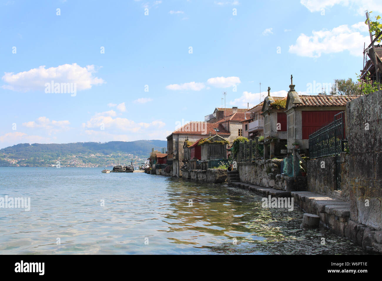 Beautiful village of Combarro in Spain unique for its horreos ...