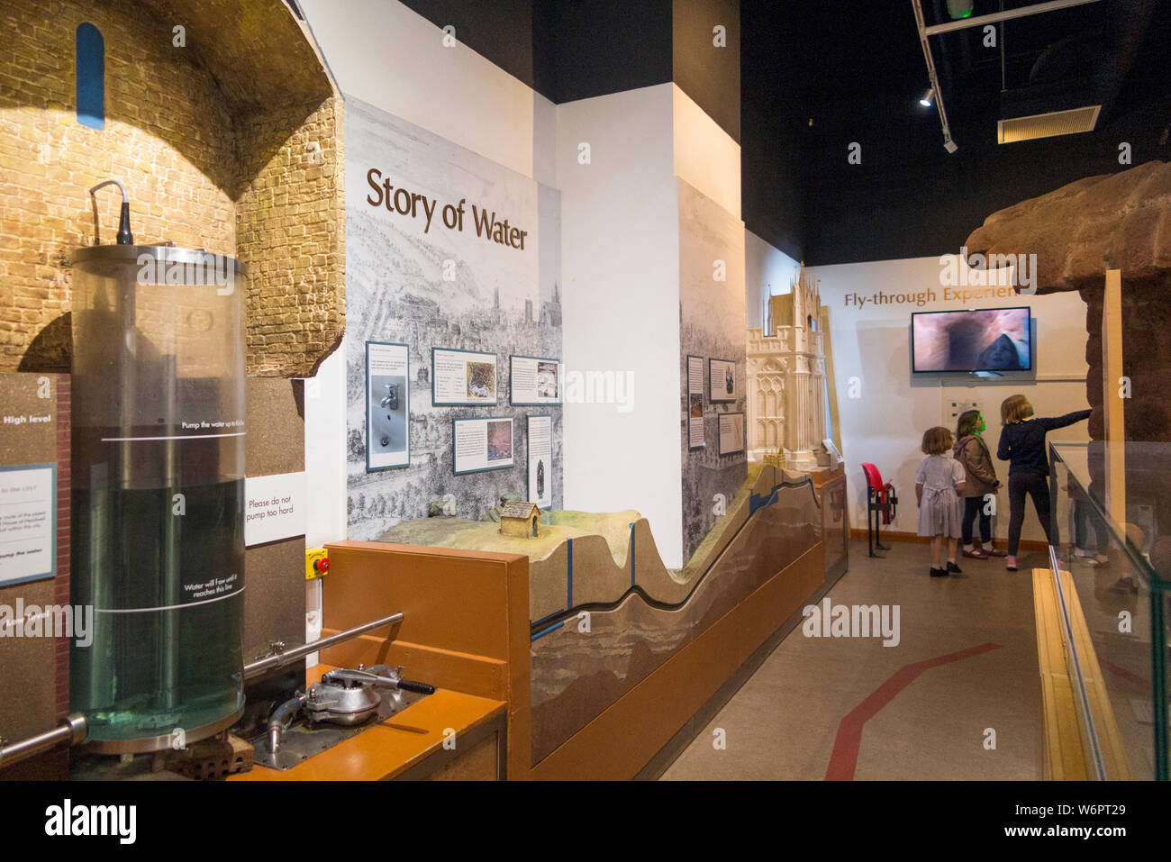 Tourists and visitors inside the Heritage Centre at the start of Exeter ...