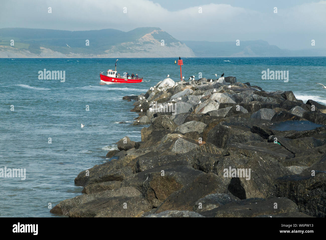 Looking out at the artificial sea defences / rock / rocks and boulders ...