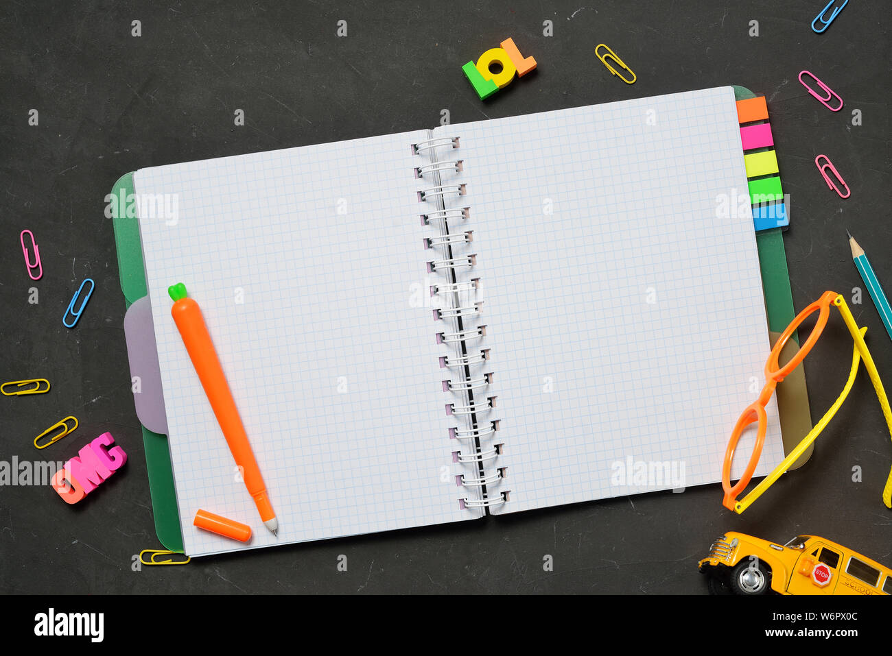 Back to School concept - open copy book with office and student ...