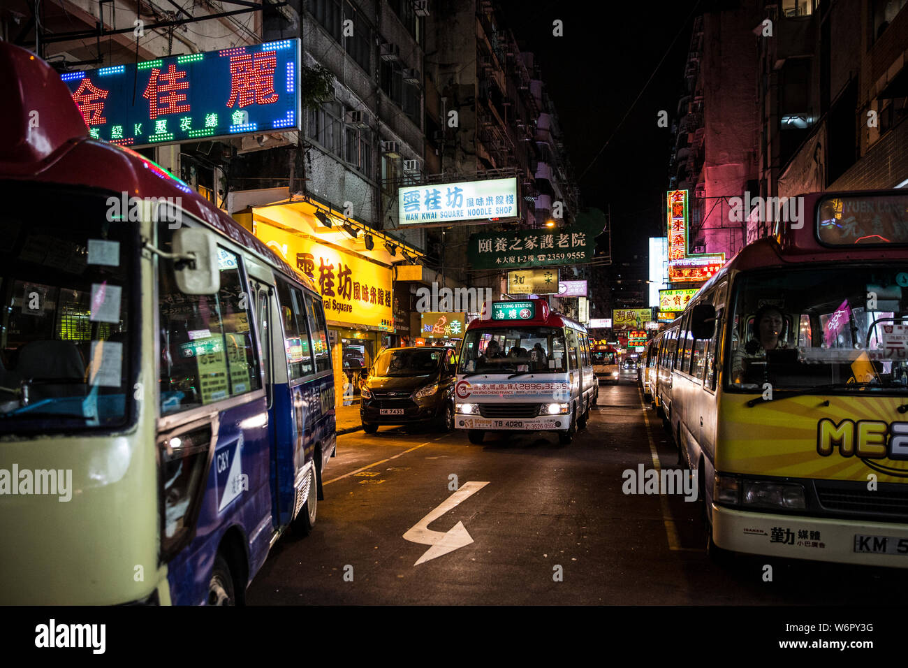 Public light buses at night. Hong Kong Stock Photo - Alamy