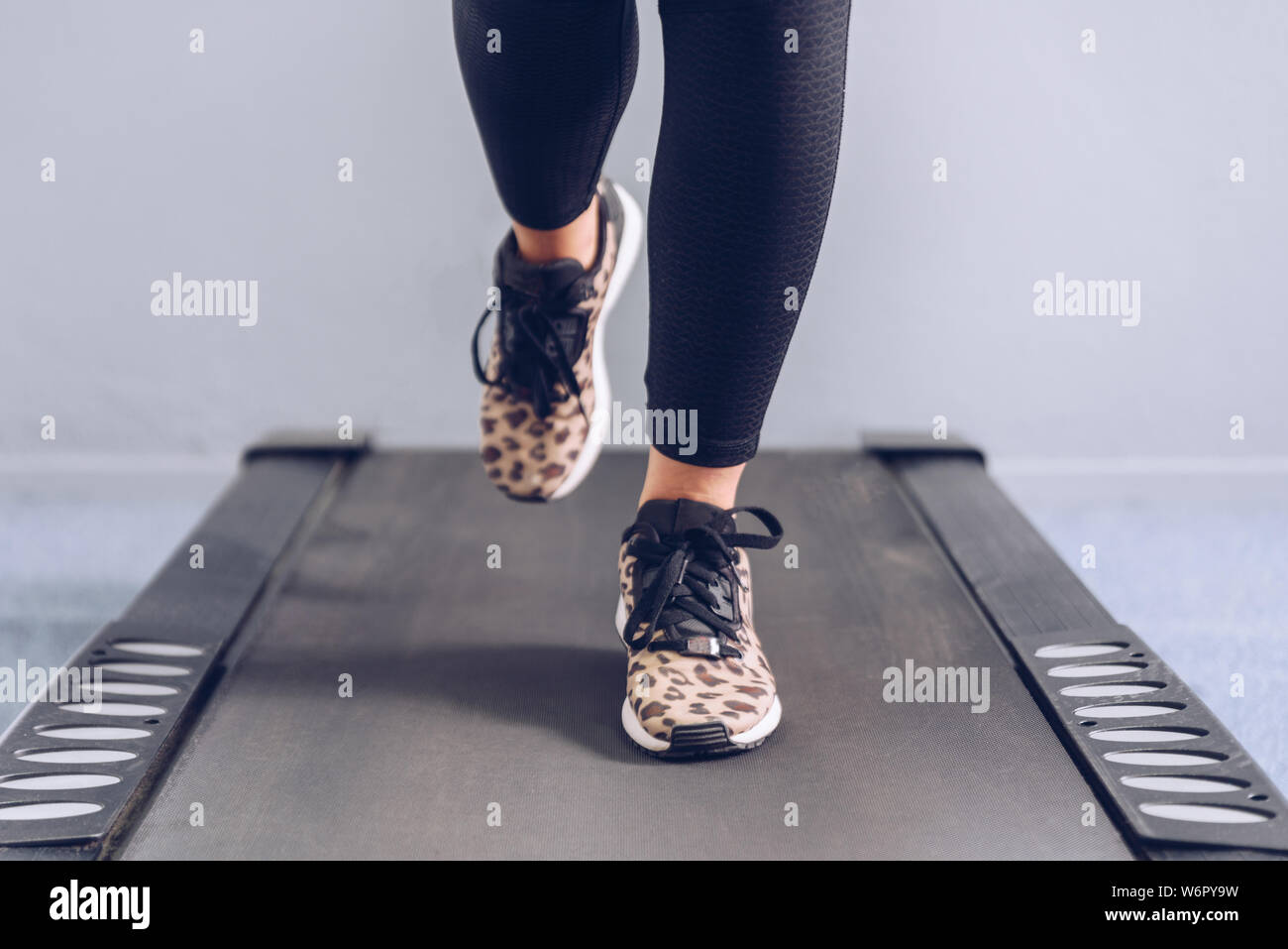 Fitness girl running on treadmill hi-res stock photography and images ...